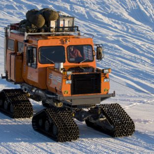 Sno-Cats and snowmobiles - British Antarctic Survey